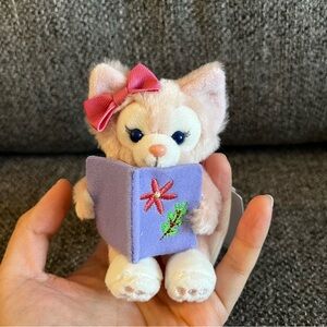 Disney | Toys | Bnwt Japan Tokyo Disneyland Plush Keychain Reading Book ...